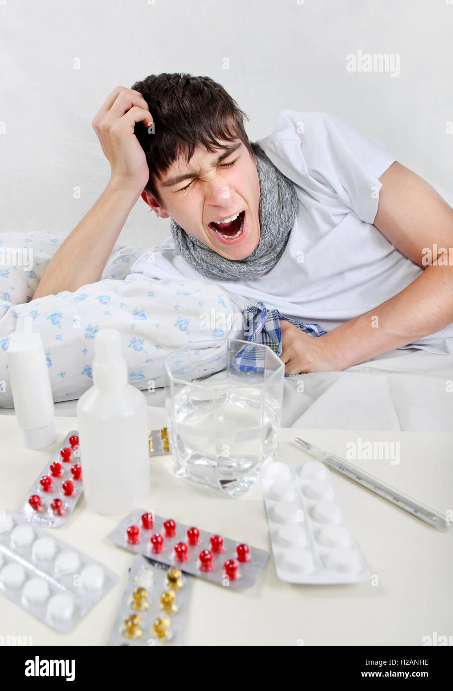 Sick Young Man with Flu Stock Photo - Alamy