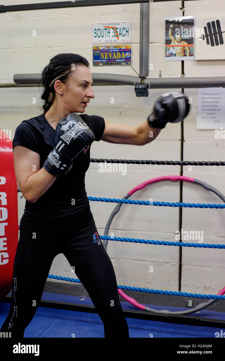 young female working out boxing in a gym england uk Stock Photo - Alamy