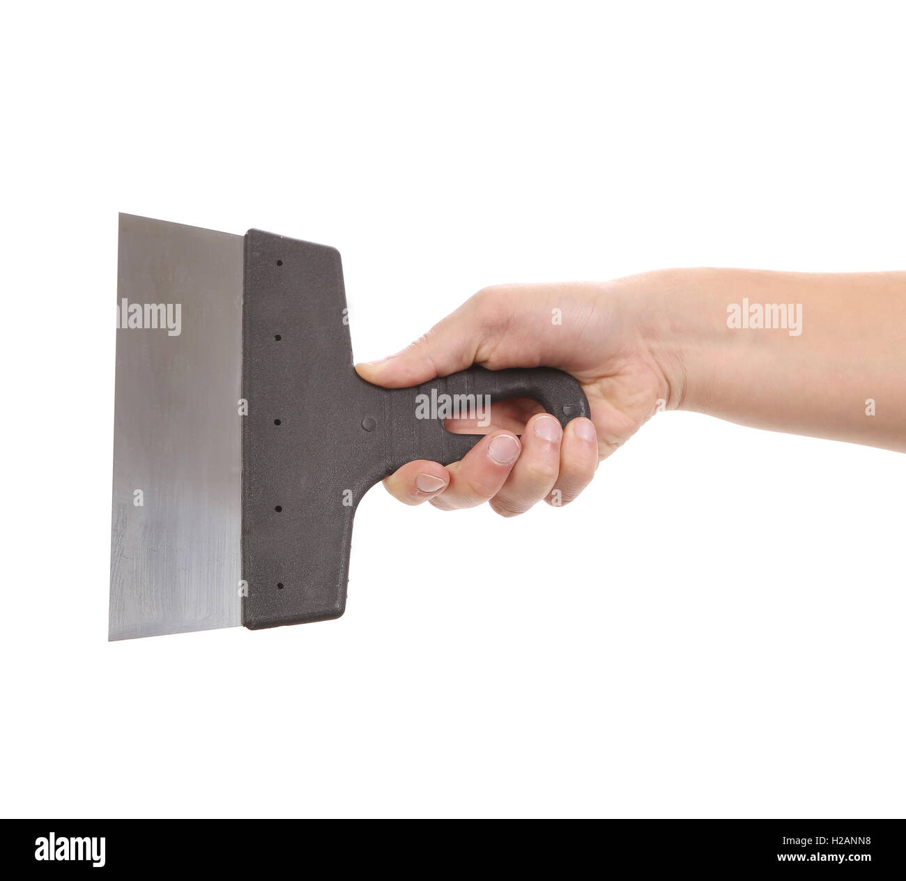 Hand holds construction spatula Stock Photo - Alamy