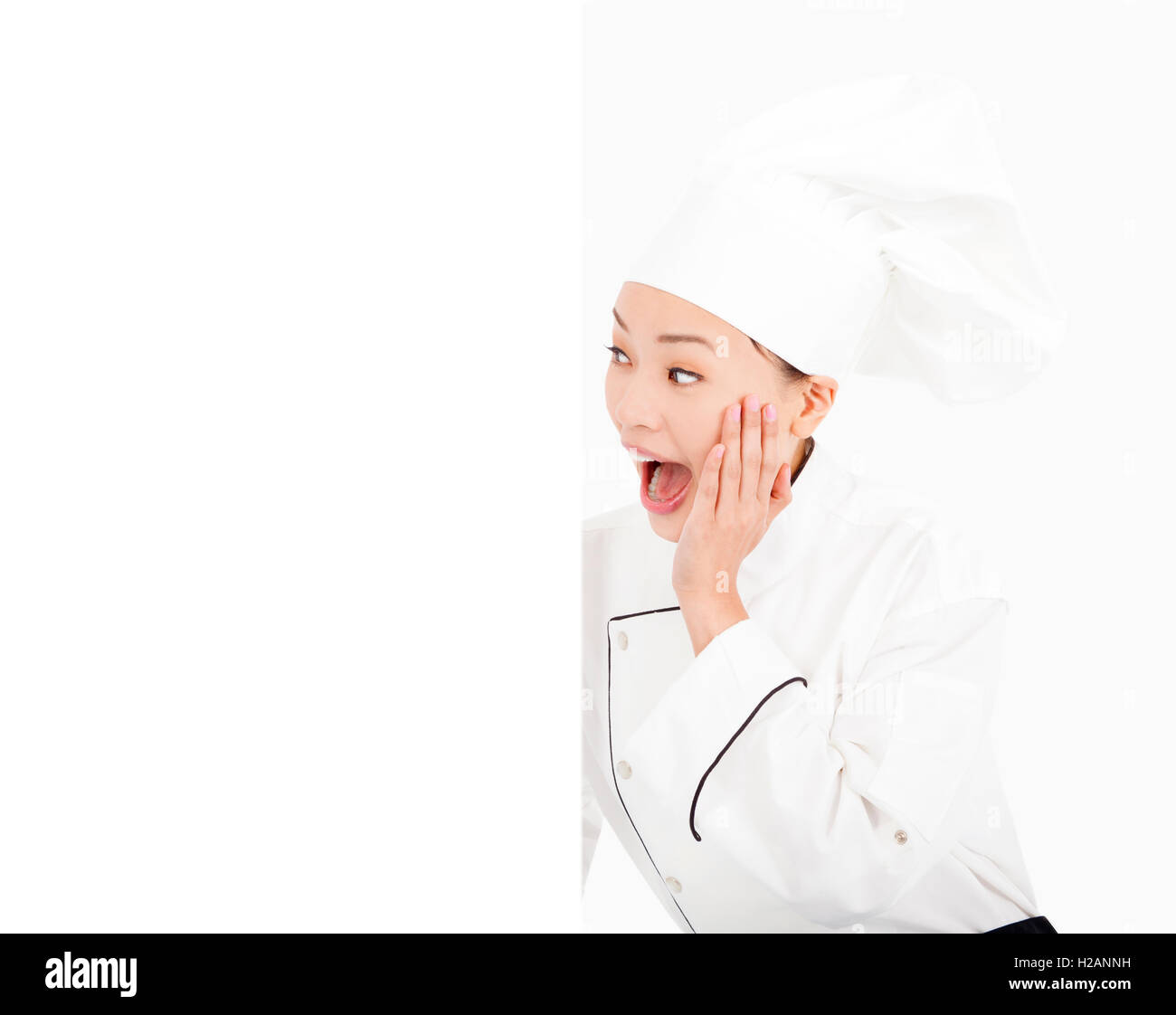 unbelievable asian woman chef looking board Stock Photo - Alamy