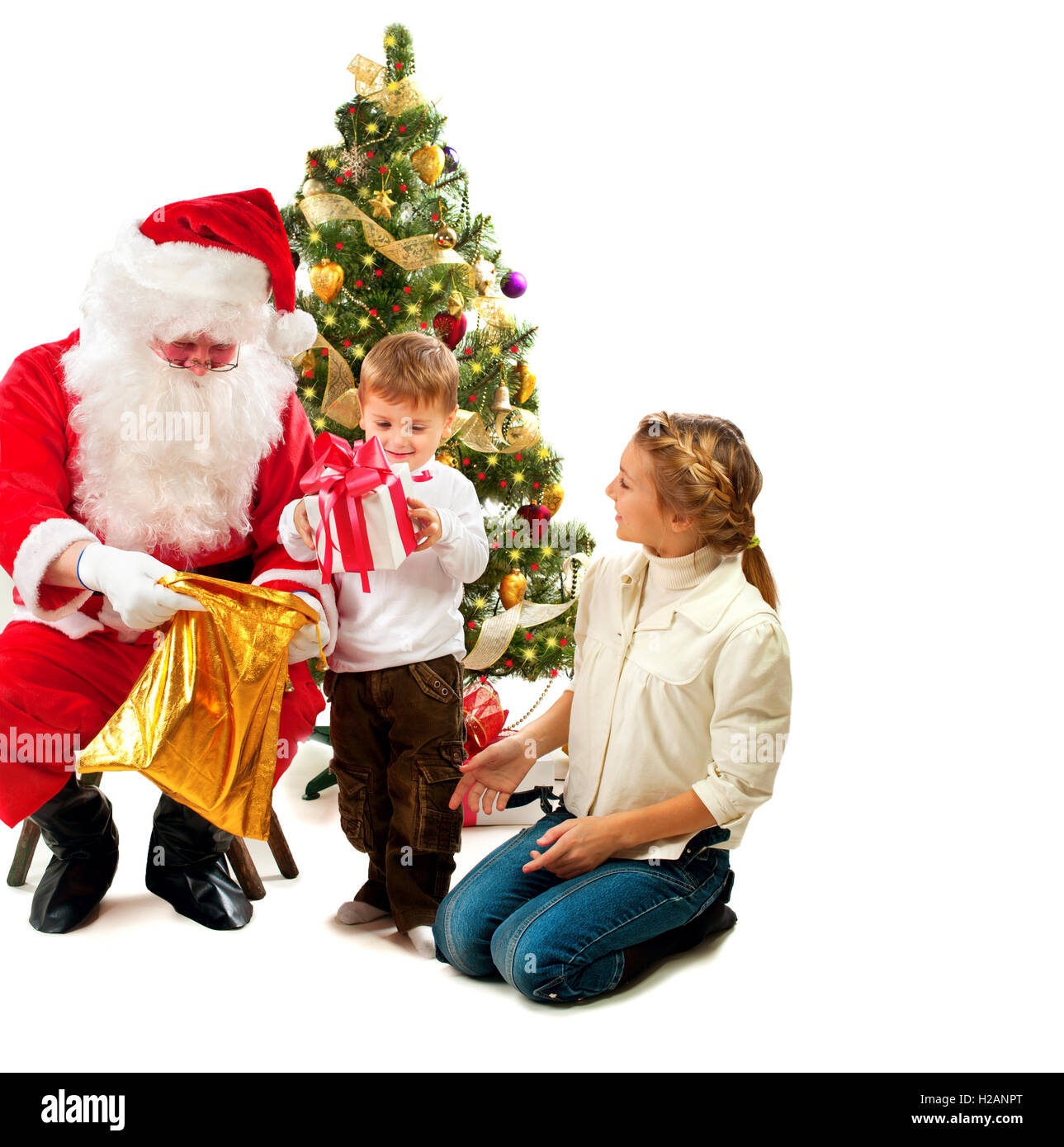 Santa Claus giving Christmas Gifts to Children. Christmas Scene Stock ...