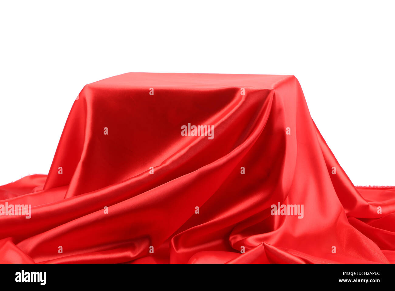 Box in red silk fabric background Stock Photo - Alamy