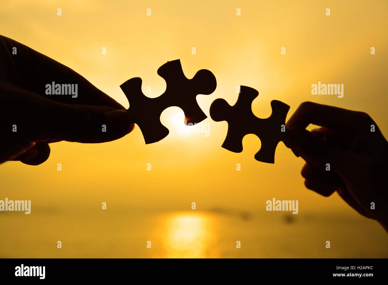 Two human hands connect hi-res stock photography and images - Alamy