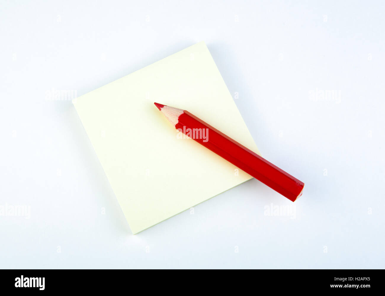 sheet of paper with red pencil Stock Photo - Alamy