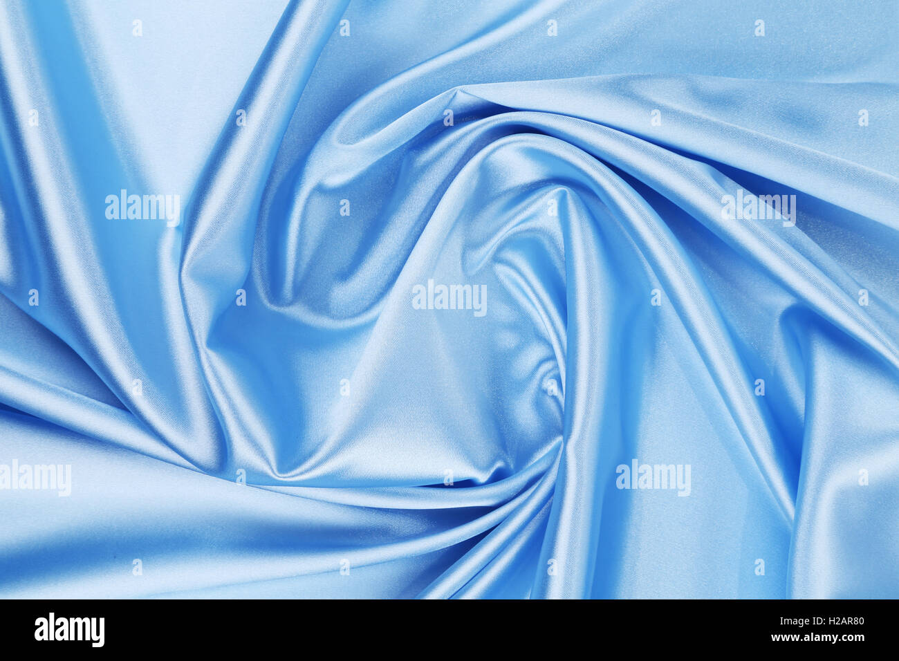 Close up of blue silk fabric background Stock Photo - Alamy