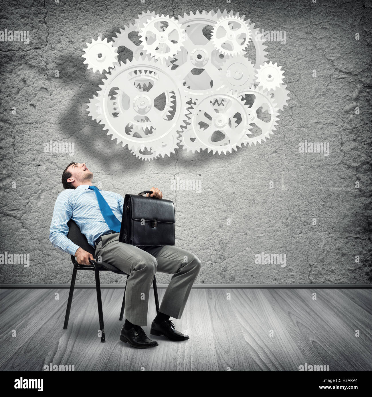 Young business man looking up Stock Photo - Alamy