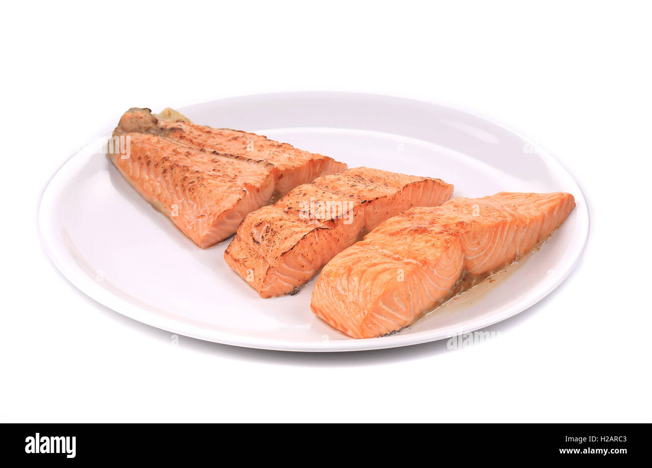 Slices of red fish fillet on plate Stock Photo - Alamy