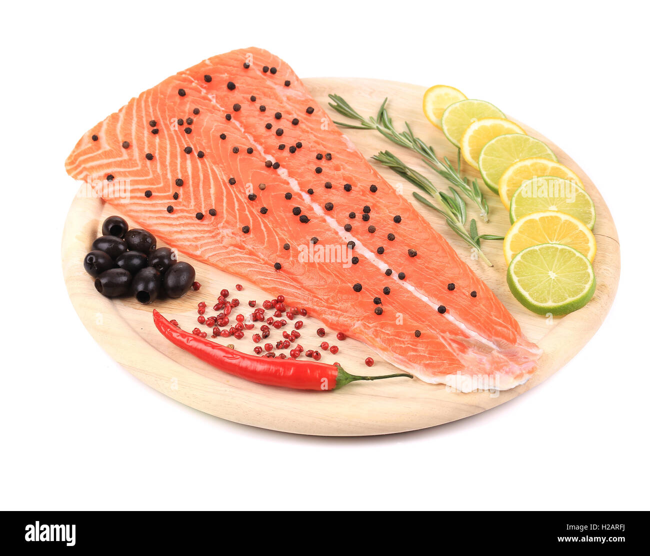 raw red fish on wooden board Stock Photo - Alamy