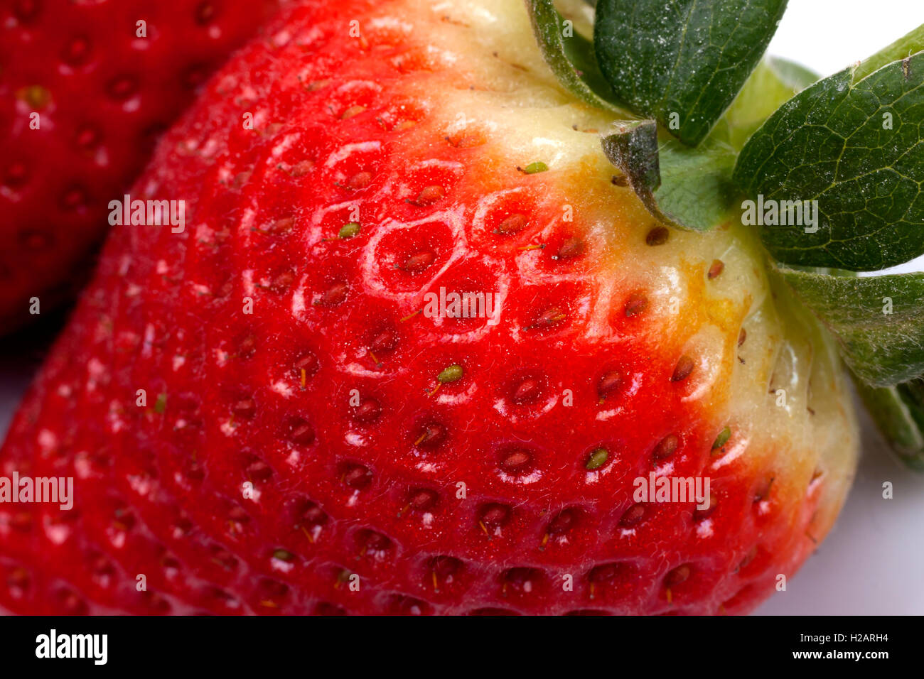 Strawberry fruits on white background Stock Photo - Alamy