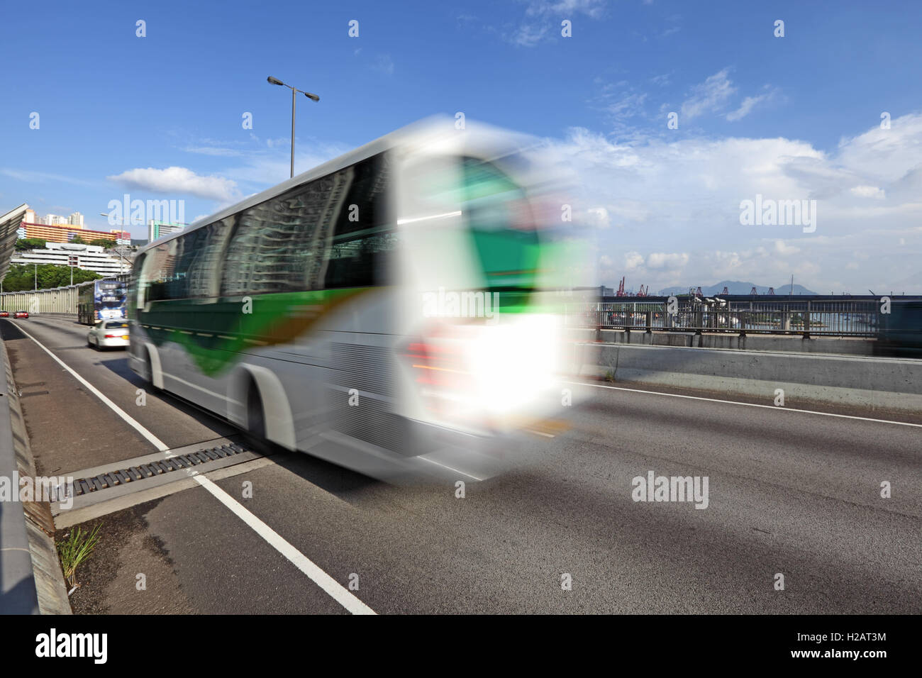 Fast moving bus Stock Photo - Alamy