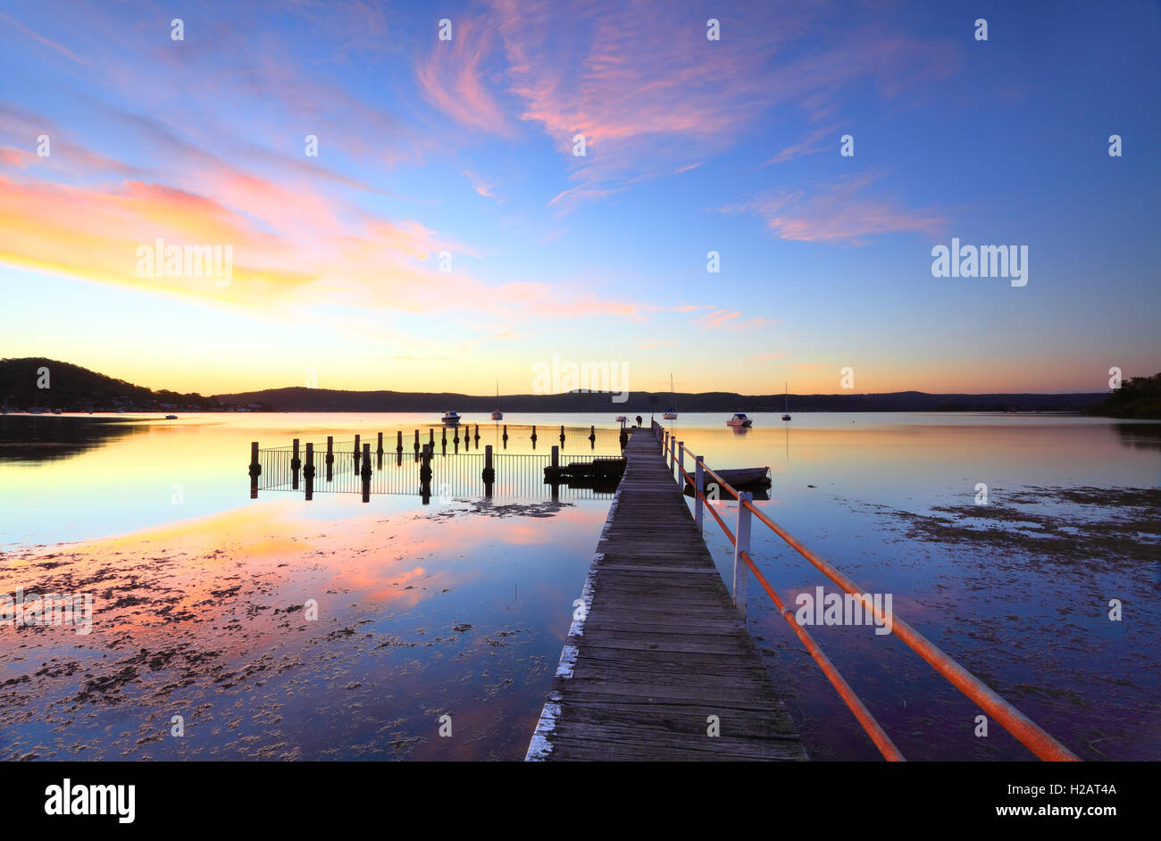 Colourful sunset and water reflections at Yattalunga Australia Stock ...