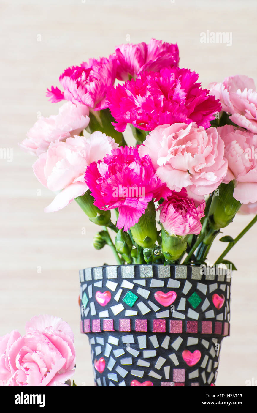 Carnation in mosaic flower pot Stock Photo - Alamy