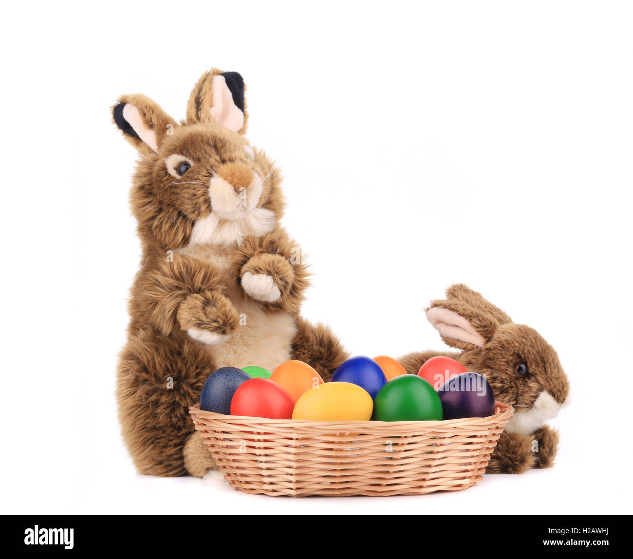 Fluffy foxy rabbit in basket with Easter eggs Stock Photo - Alamy