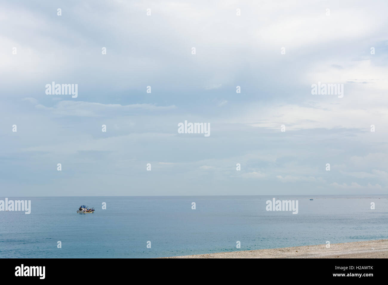 Seascape with boat Stock Photo - Alamy