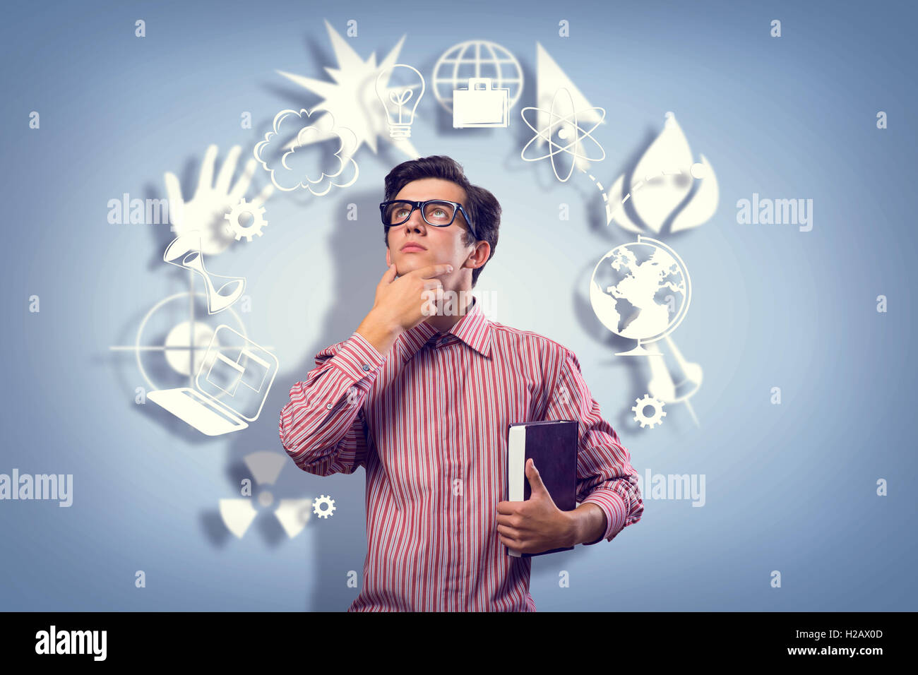 young man scientist with glasses thinking Stock Photo - Alamy