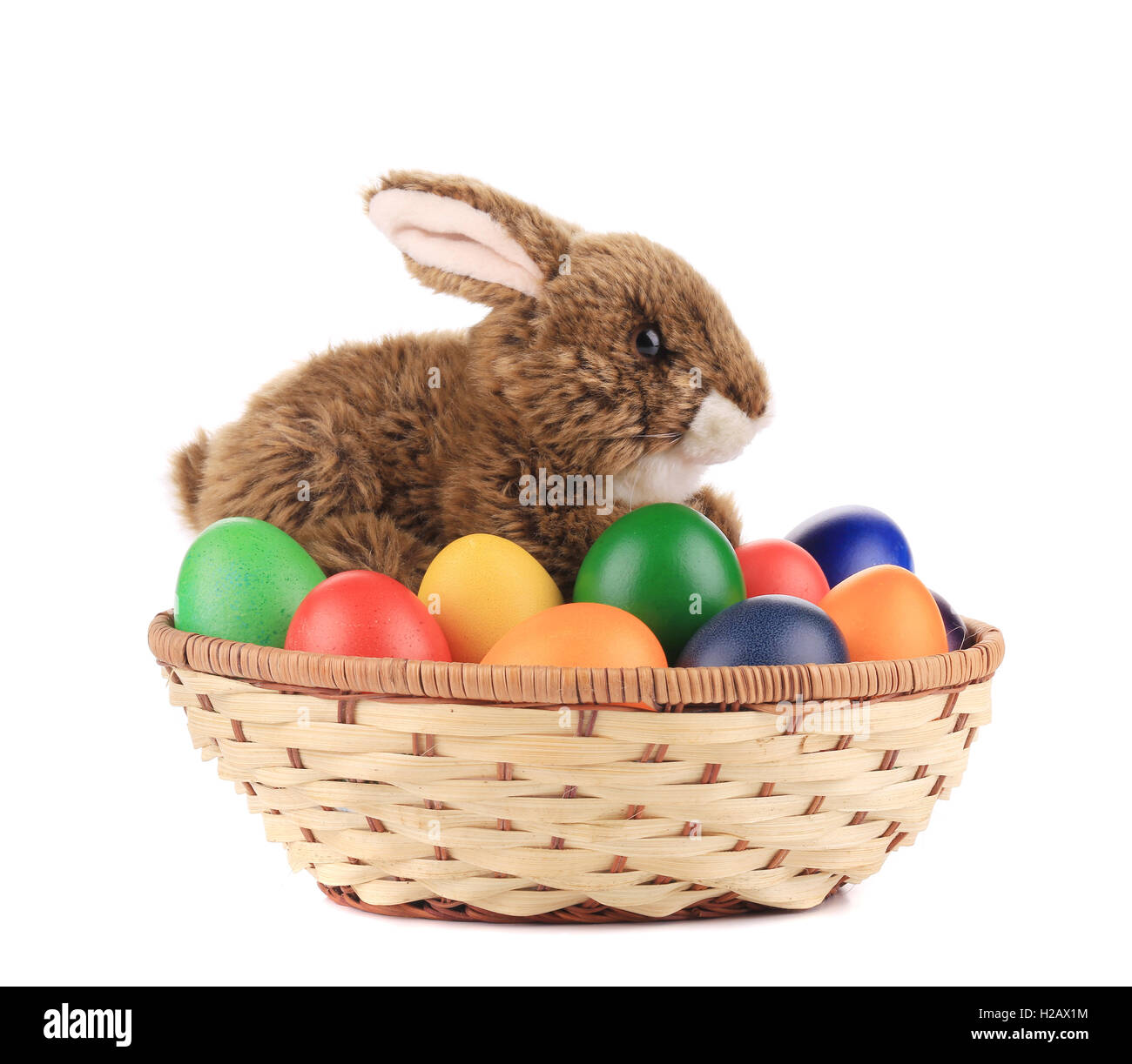 Easter eggs and basket isolated Stock Photo - Alamy