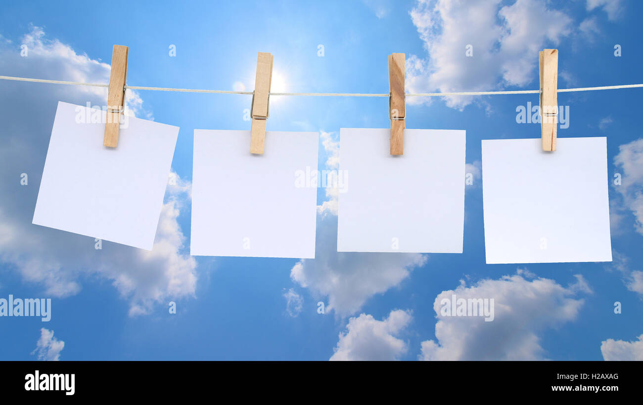 blank notes hanging on a rope with clipping path Stock Photo - Alamy