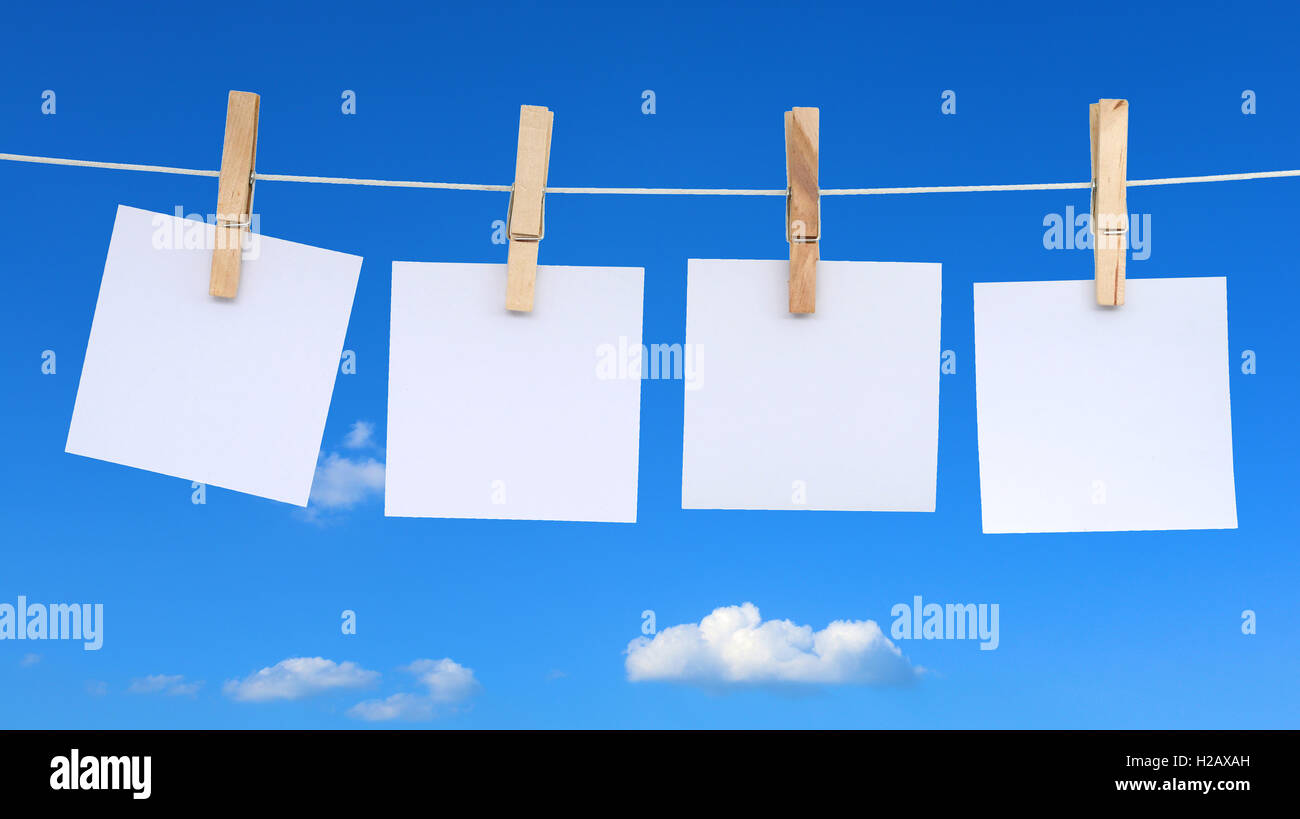 blank notes hanging on a rope with clipping path Stock Photo - Alamy