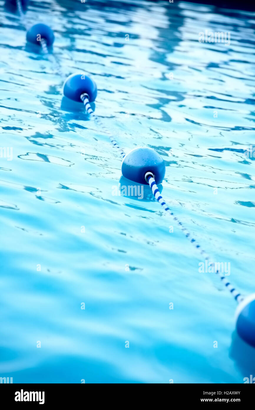 Blue water buoys in pool Stock Photo - Alamy