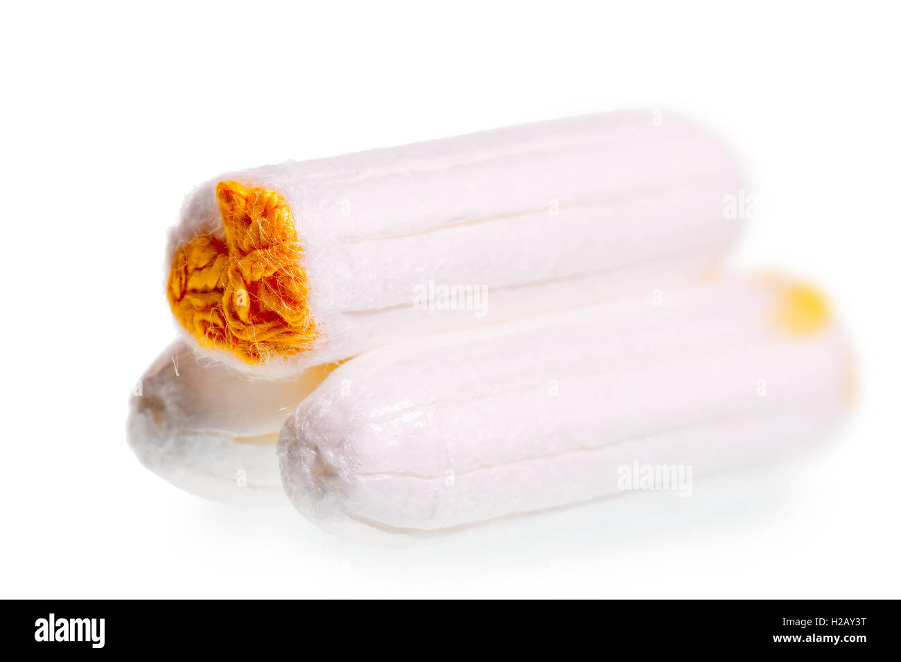 three feminine hygiene tampon on white background Stock Photo - Alamy