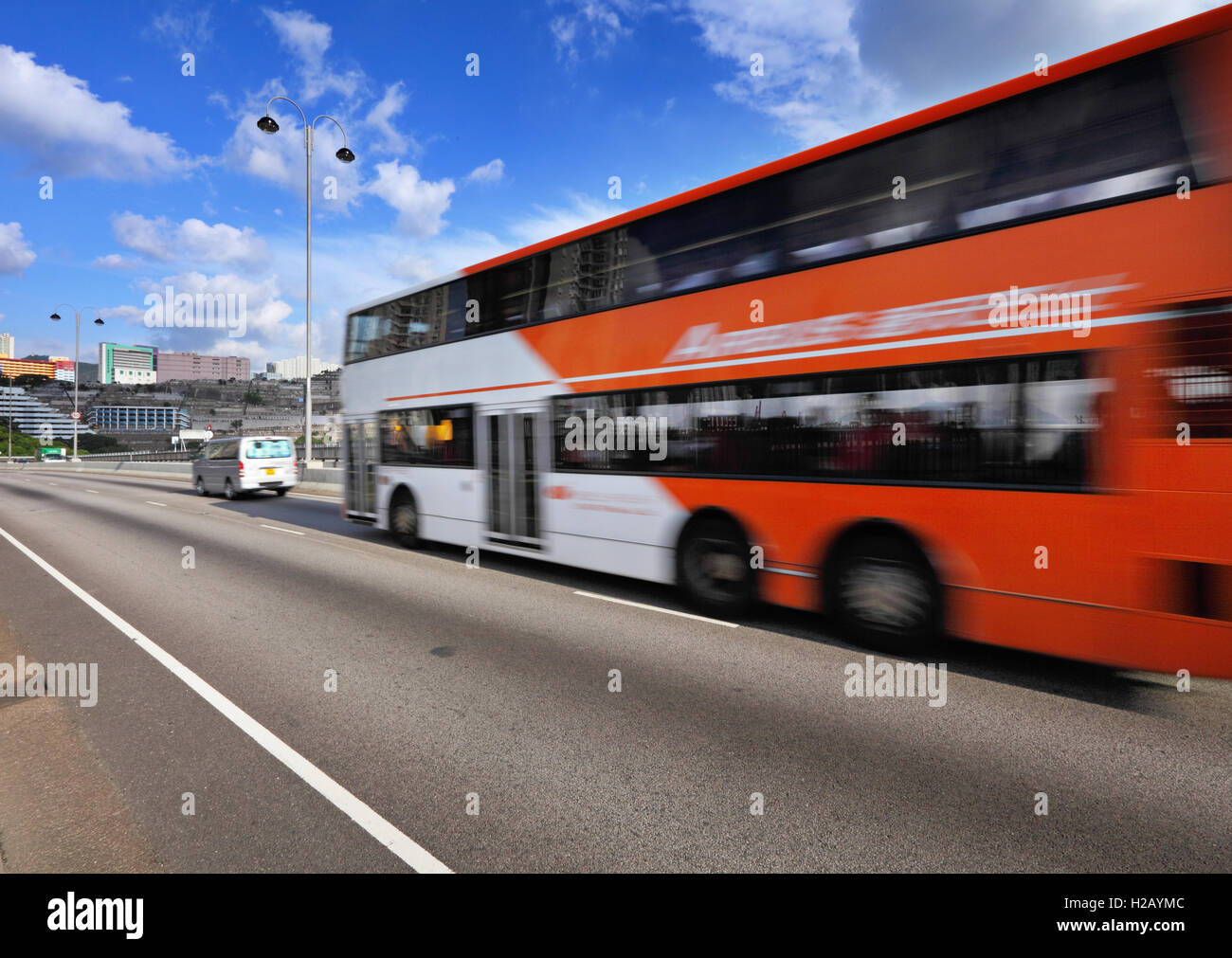 Fast moving bus on highway Stock Photo - Alamy
