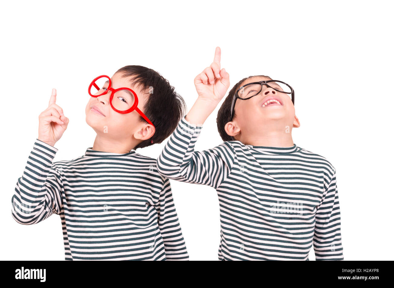 Two brother smiling on white background Stock Photo - Alamy