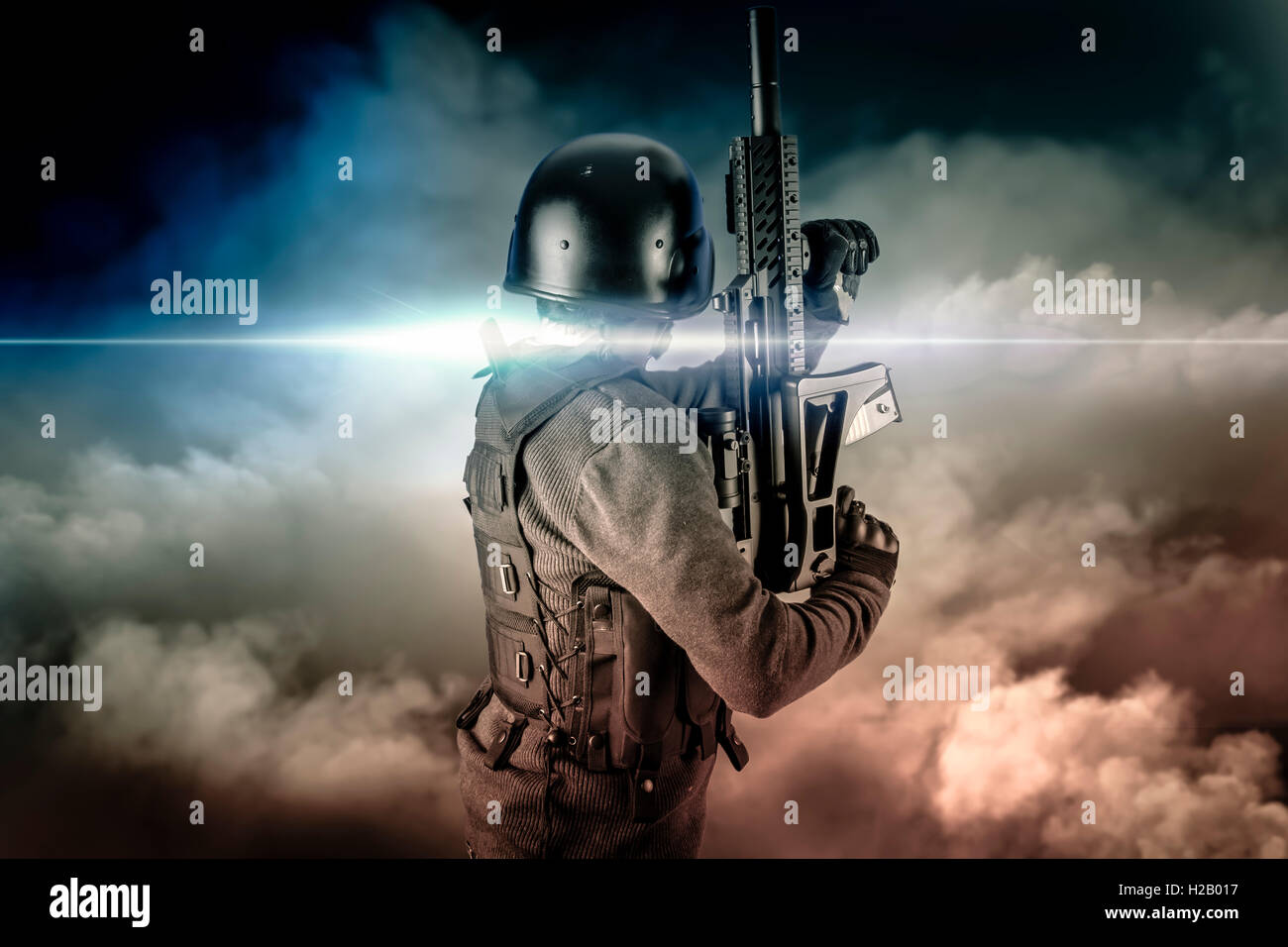 Soldier in uniform with rifle, assault sniper on apocalyptic clo Stock ...