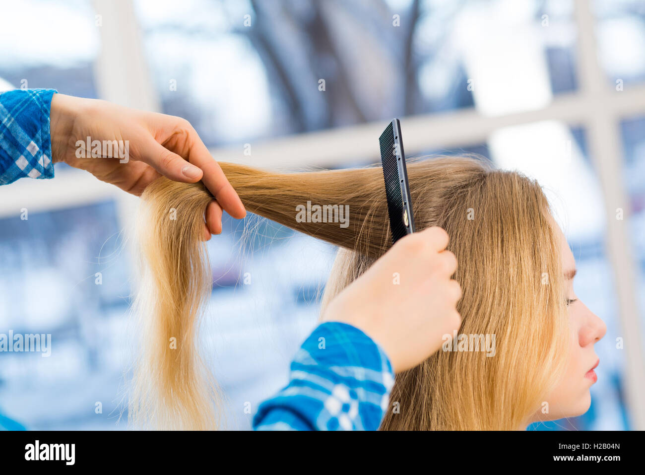 close up combing hair Stock Photo - Alamy