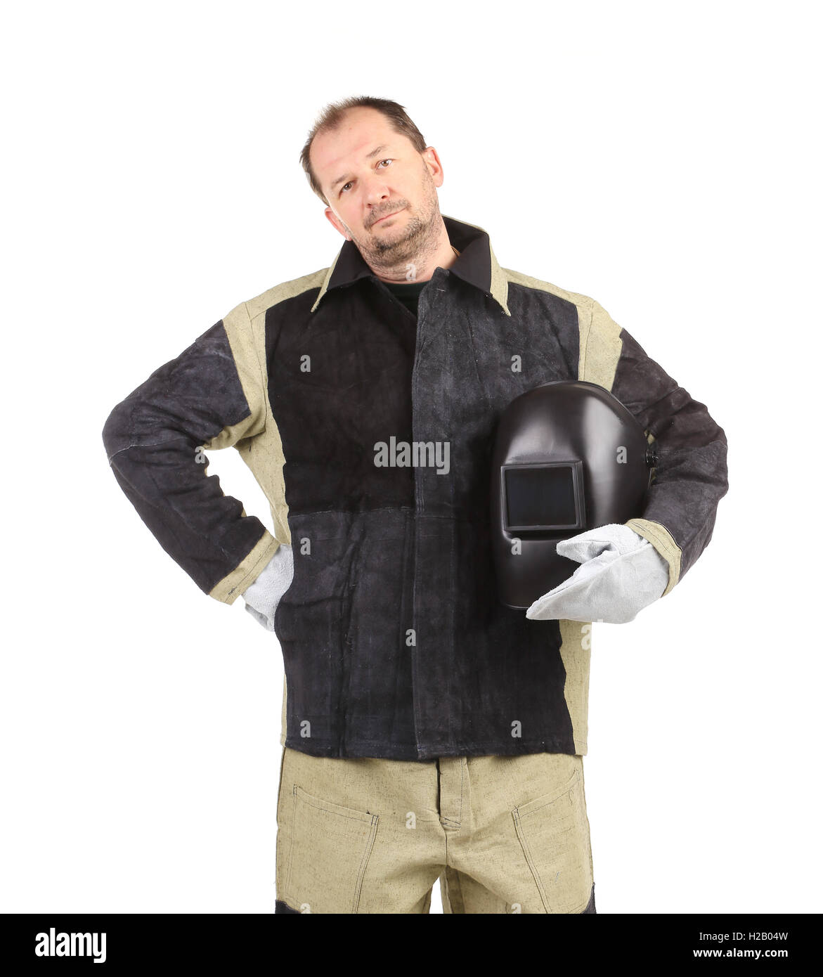 welder man holding welding mask Stock Photo - Alamy