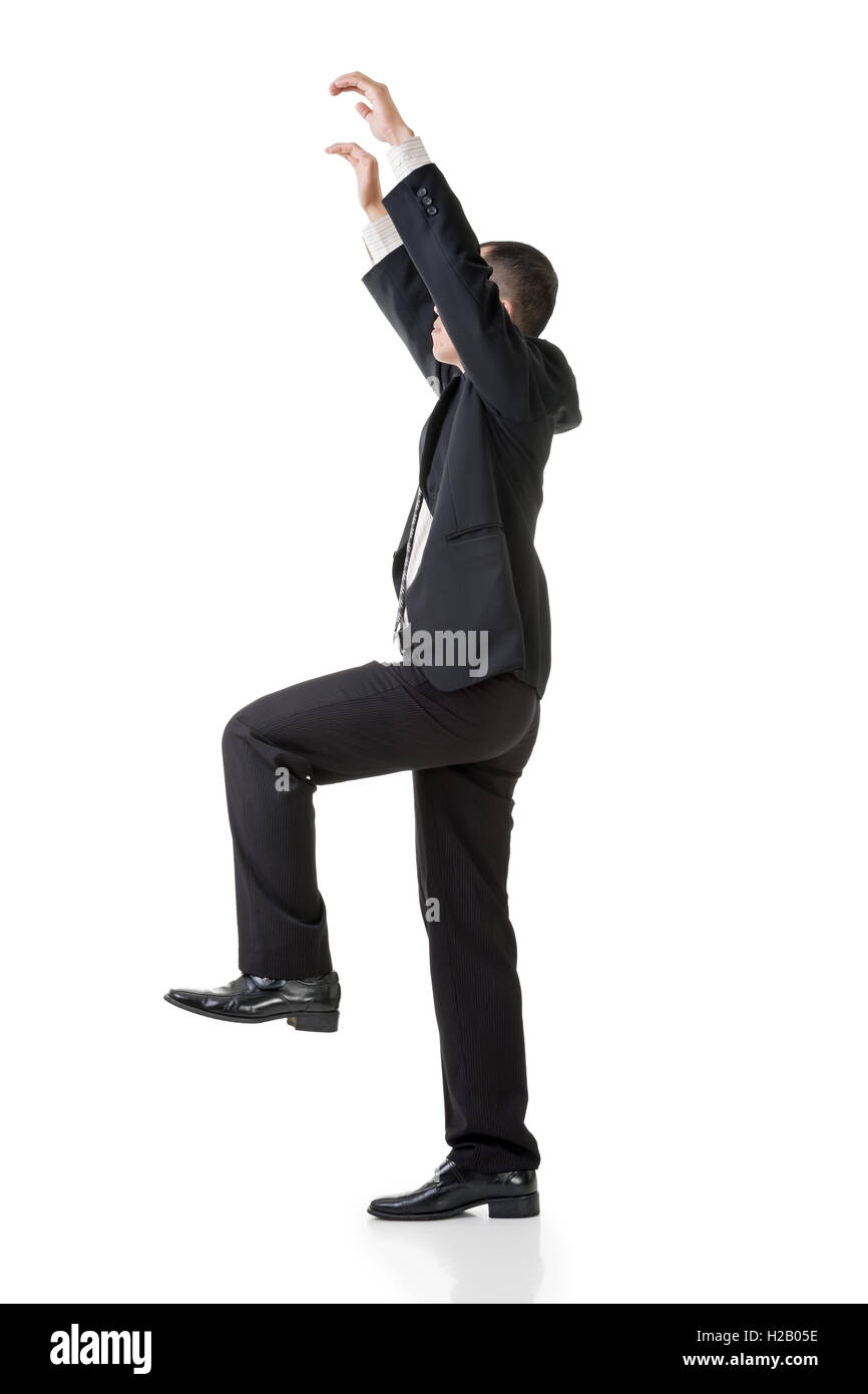 Asian business man pull up pose, full length portrait isolated o Stock ...