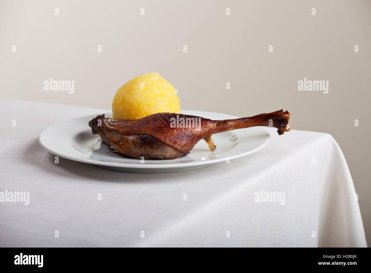 Roasted goose on table hi-res stock photography and images - Alamy