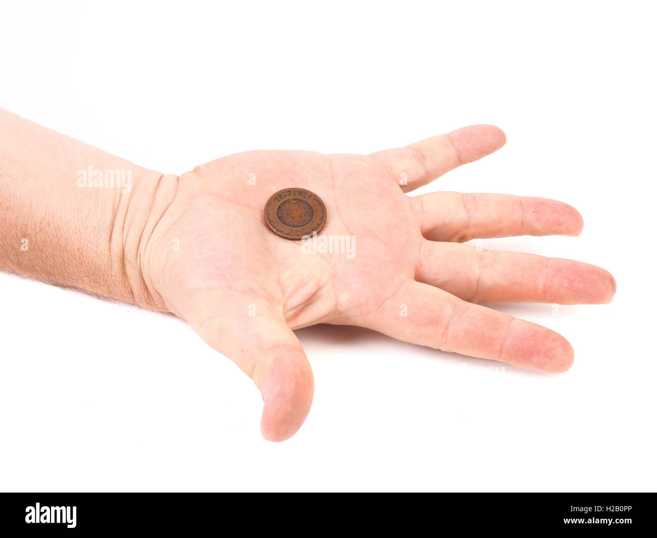one coin in hand Stock Photo - Alamy