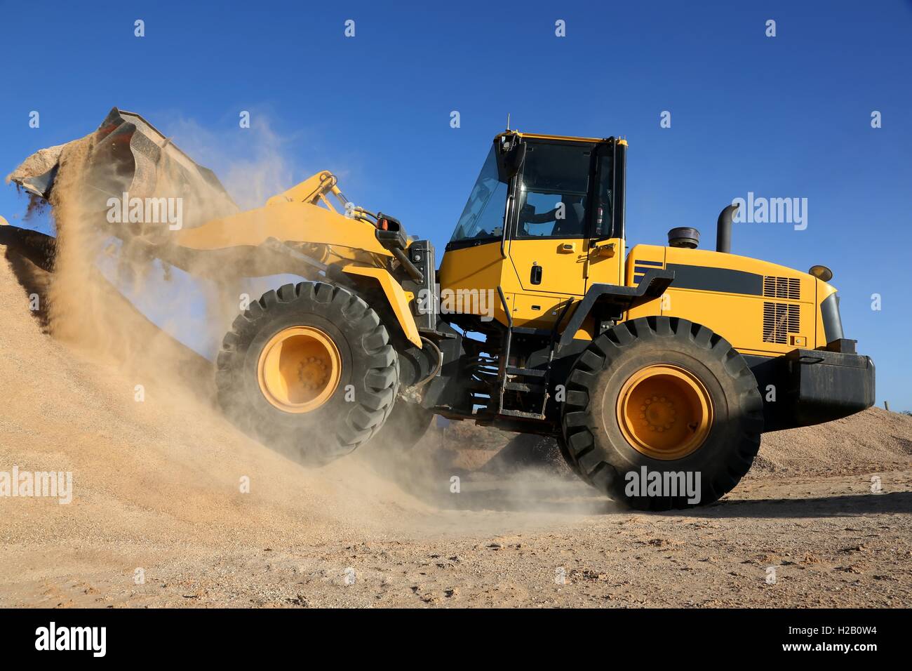 Bulldozer Working with Sand Stock Photo - Alamy