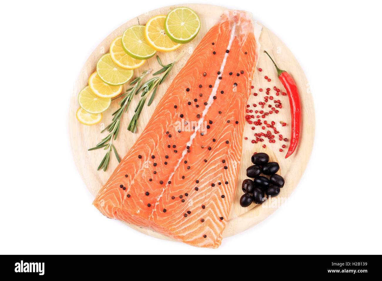 Marine raw fish fillets decorated Stock Photo - Alamy