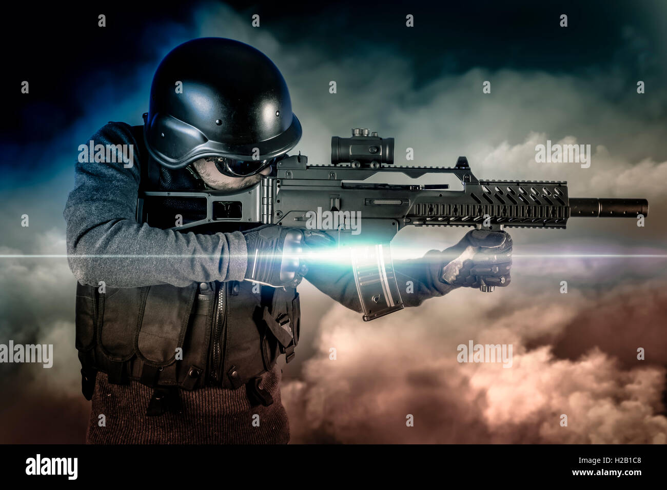 Soldier in uniform with rifle, assault sniper on apocalyptic clo Stock ...