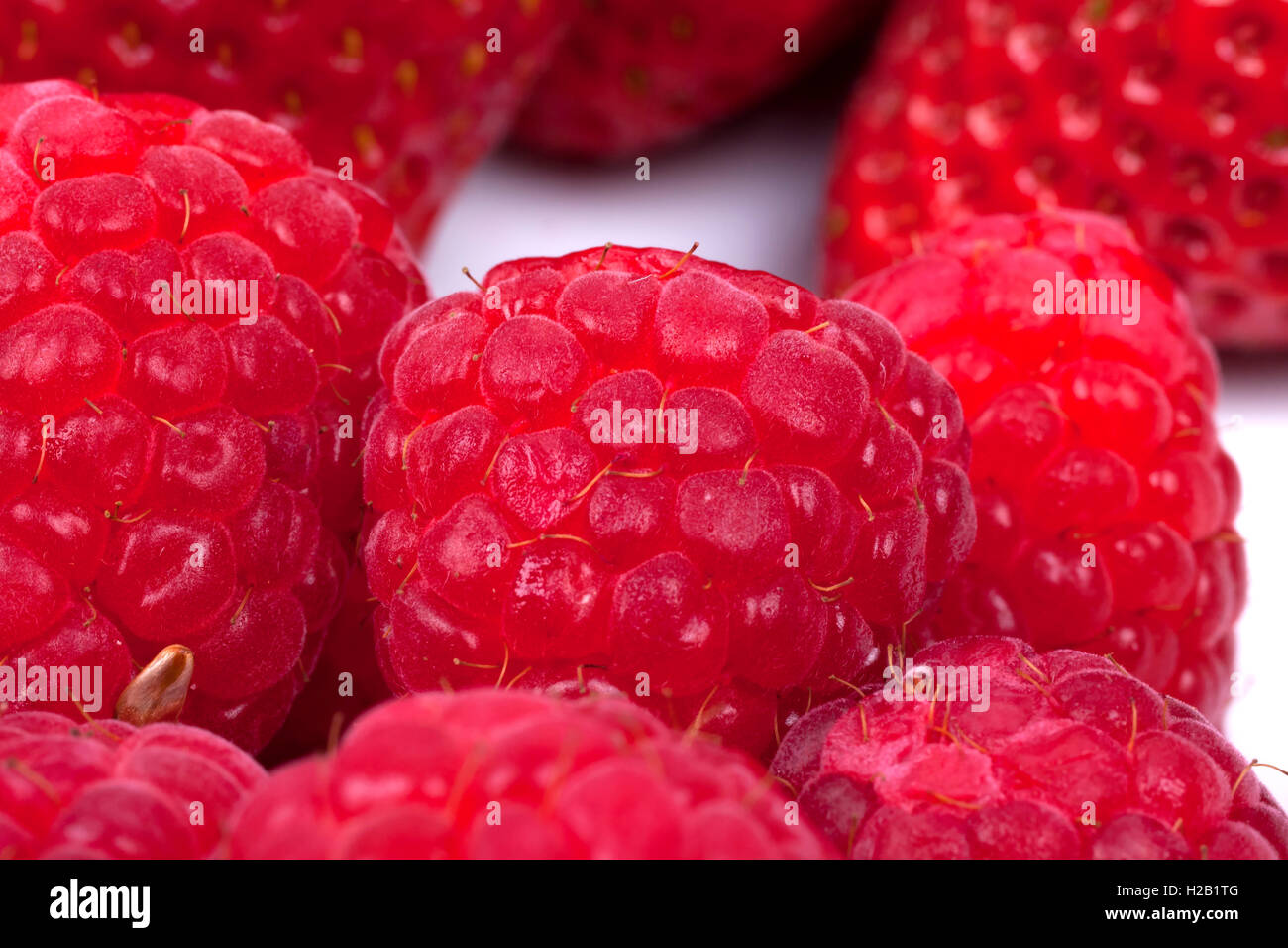 raspberries fruits on white background Stock Photo - Alamy