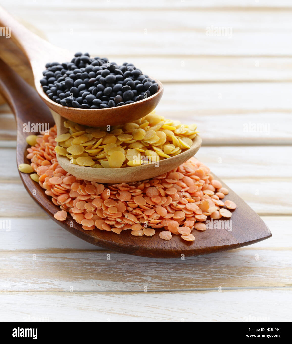 different varieties of lentils, red, yellow and black Stock Photo - Alamy