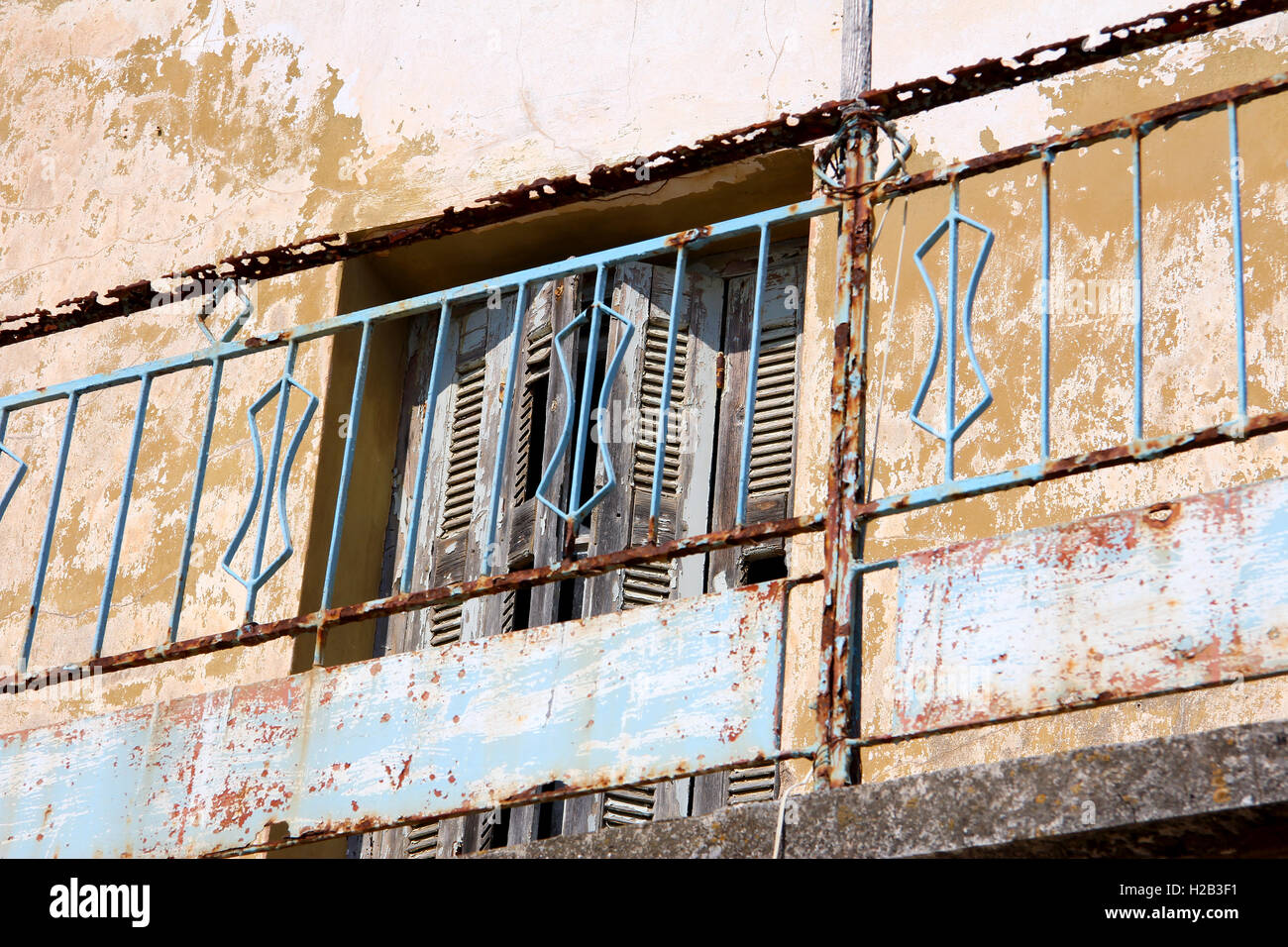 rusted railing with shutters Stock Photo - Alamy