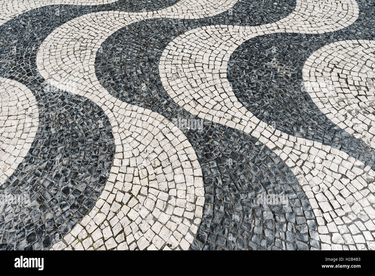 Wavy pattern in pavement, black and white, cobblestones, Rossio, Lisbon ...
