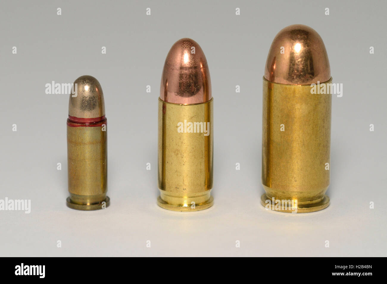 Row of pistol ammunition, different calibers Stock Photo - Alamy
