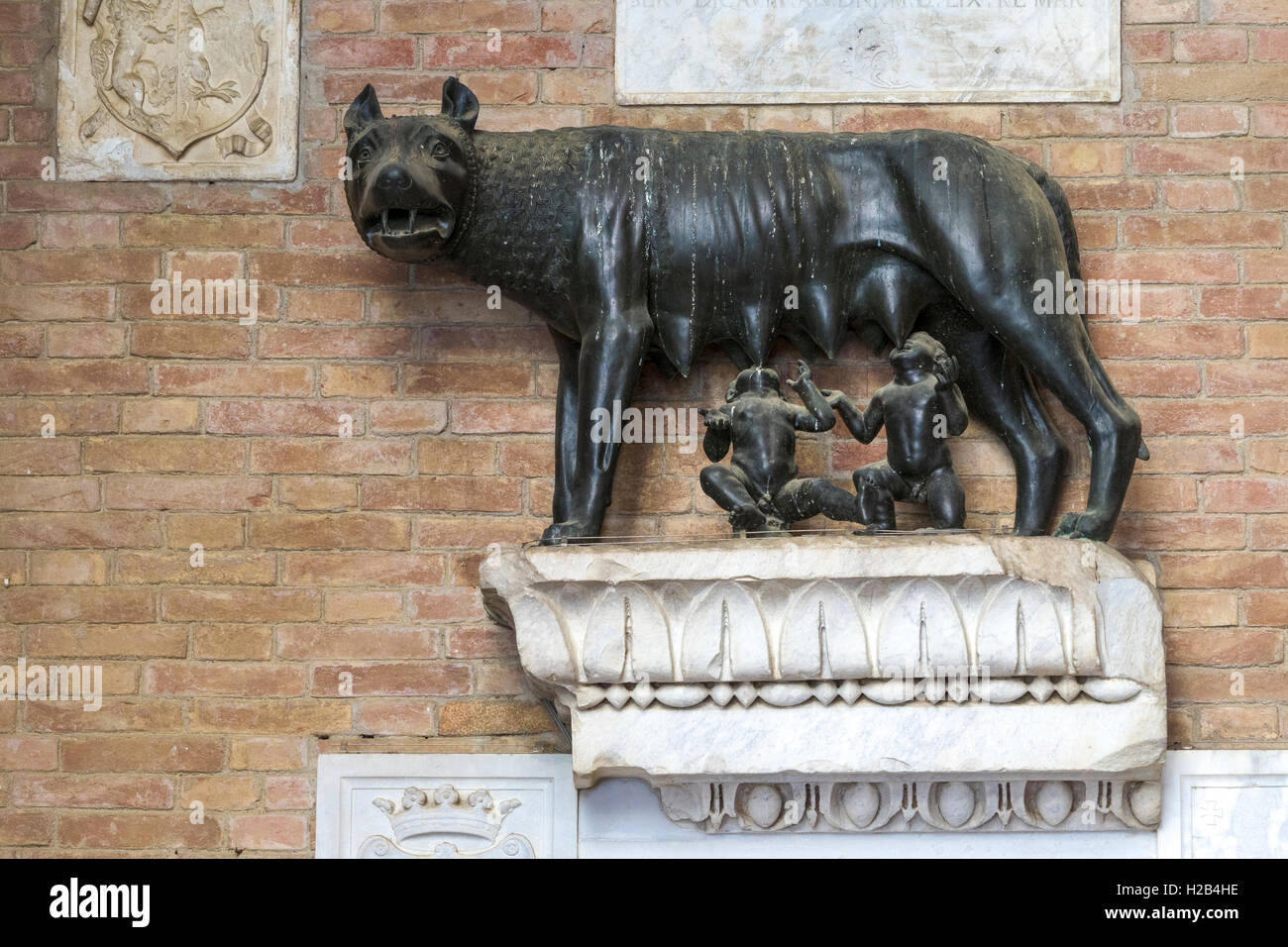 Bronze sculpture, Capitoline Wolf, breastfeeding twins Romulus and ...