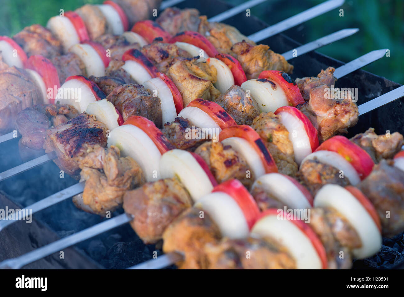 Barbecue with delicious grilled meat Stock Photo - Alamy