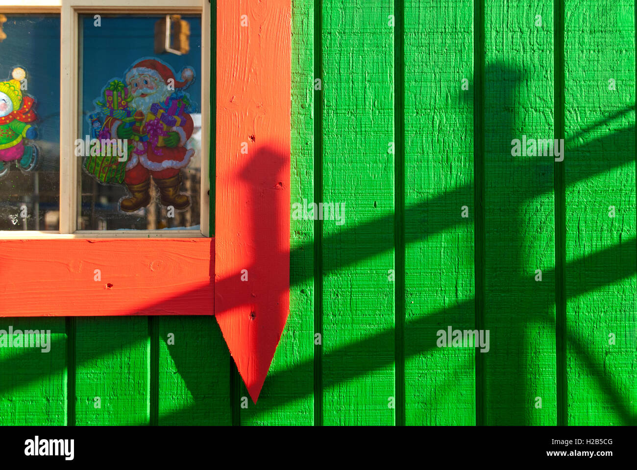 A bright green and red Christmas shack Stock Photo - Alamy
