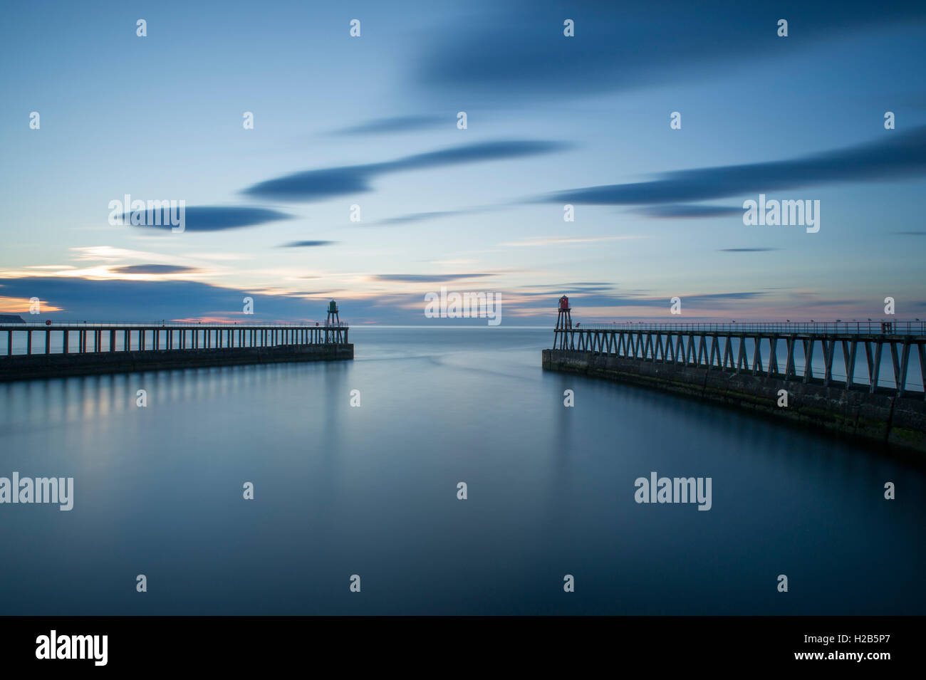 A long exposure of a summer sunset over Whitby Harbour on the North ...