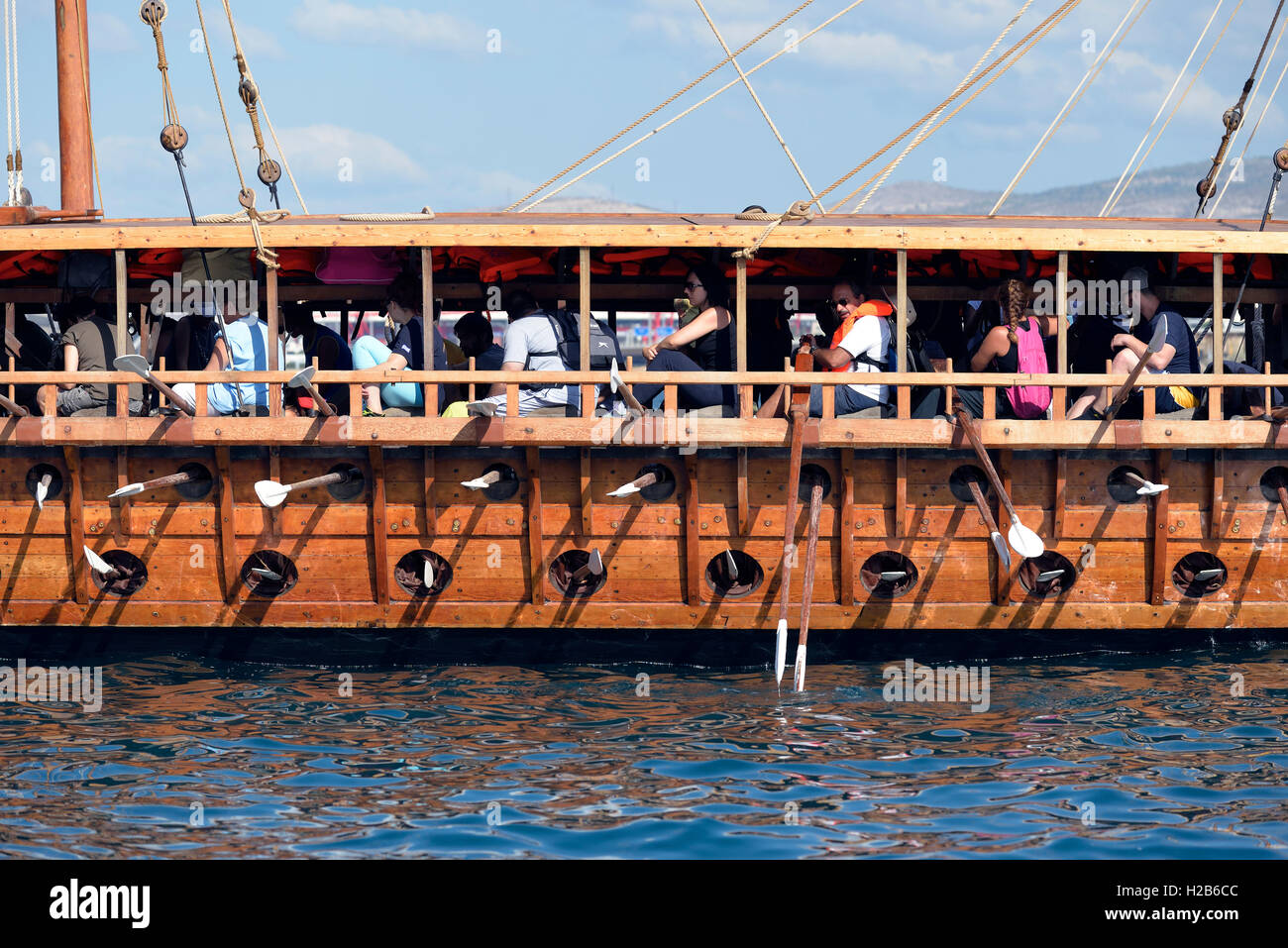 Full scale copy of an ancient trireme with volunteer rowers in Faliro ...