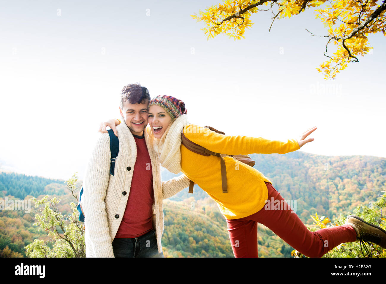 Beautiful couple in autumn nature against colorful autumn forest Stock ...