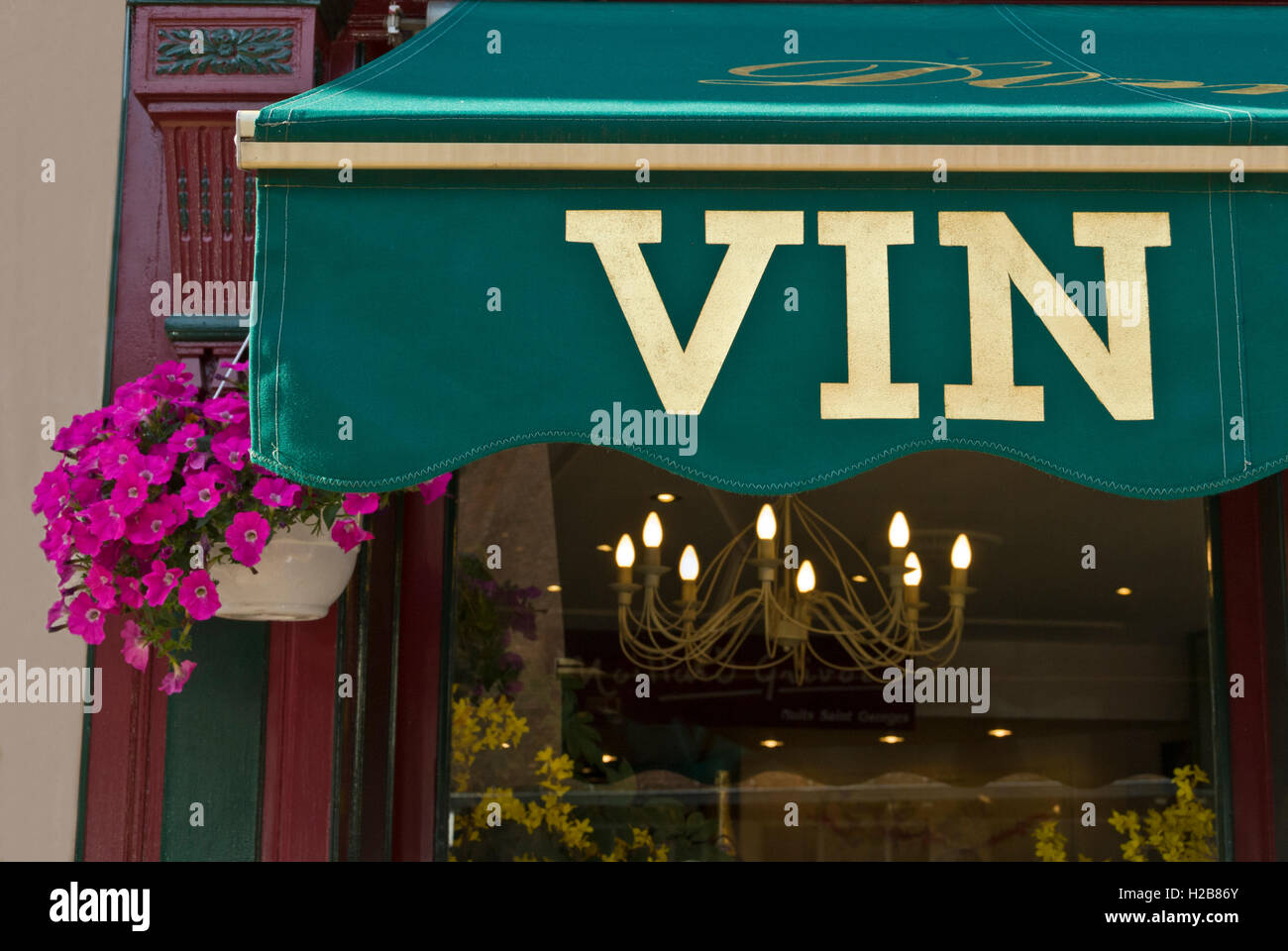 VIN SIGN Wine shop sign awning over display window in the town square ...