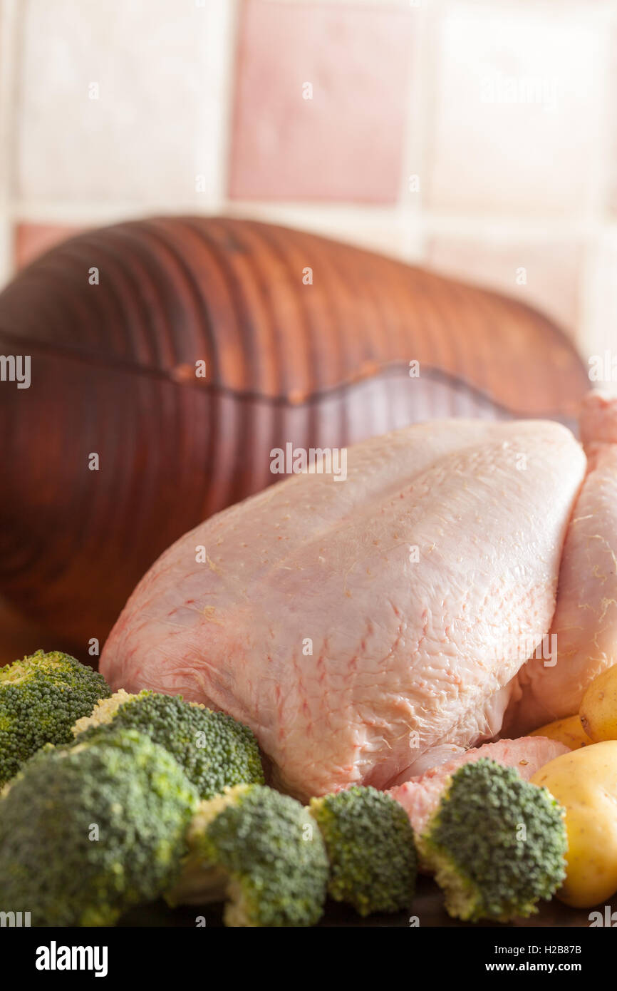 Chicken ready to cook in a clay brick Stock Photo - Alamy