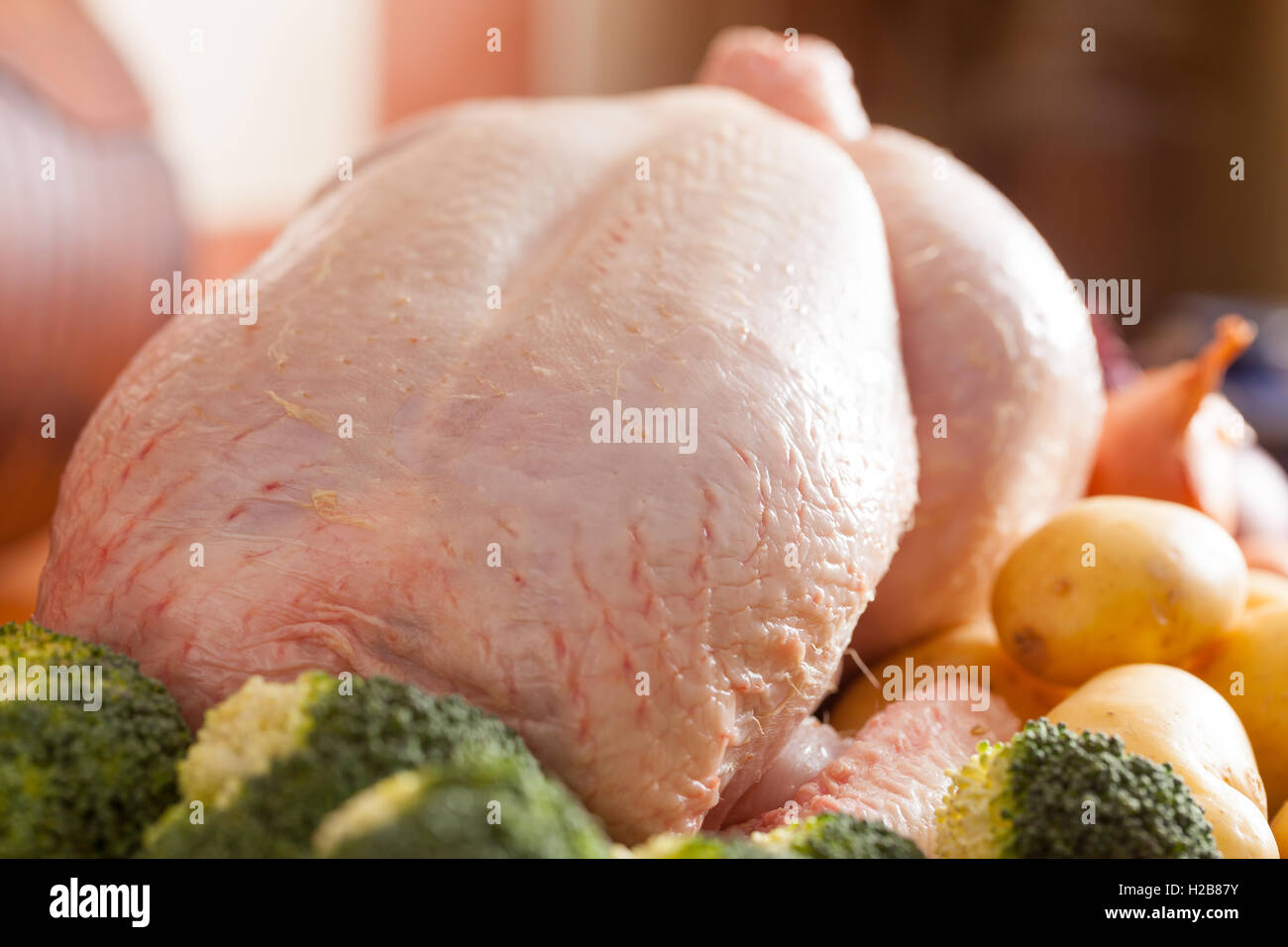 Chicken ready to cook in a clay brick Stock Photo - Alamy