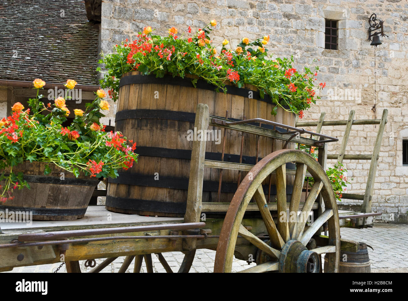 Historic Burgundy wine barrels on old vineyard trailer used as ...